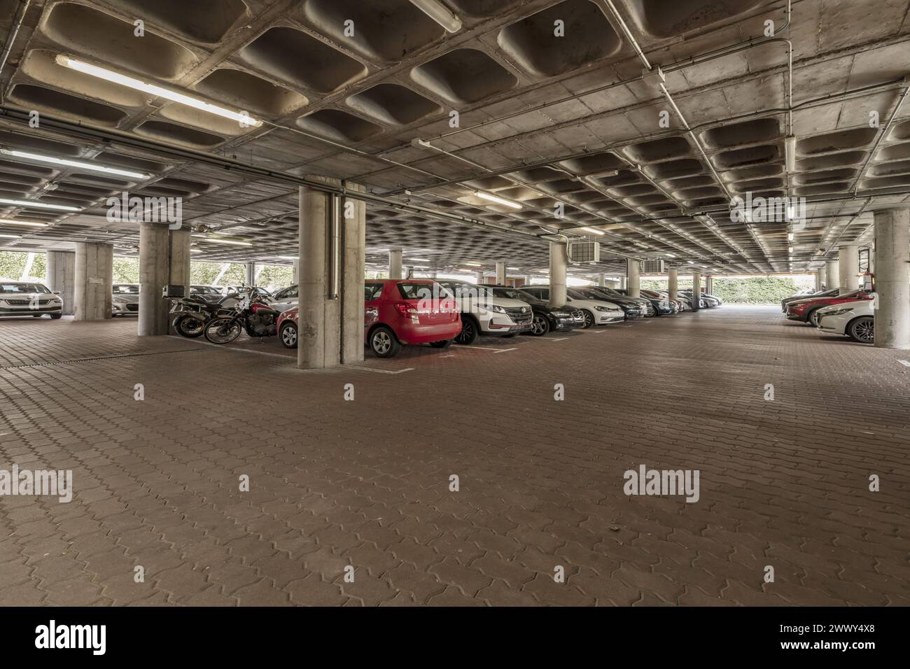 Parking area on the ground floor of an office building Stock Photo - Alamy
