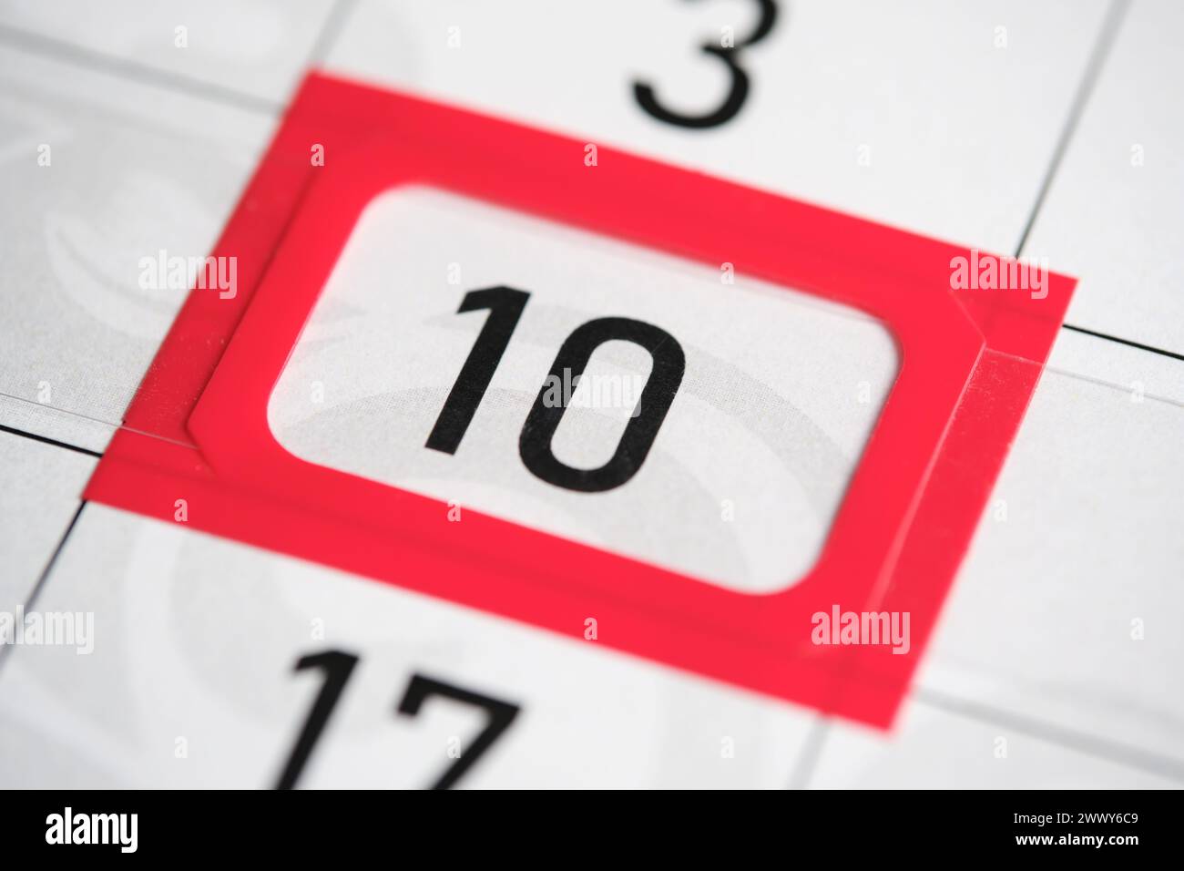 Calendar date. The 10th number the calendar is highlighted in a red ...