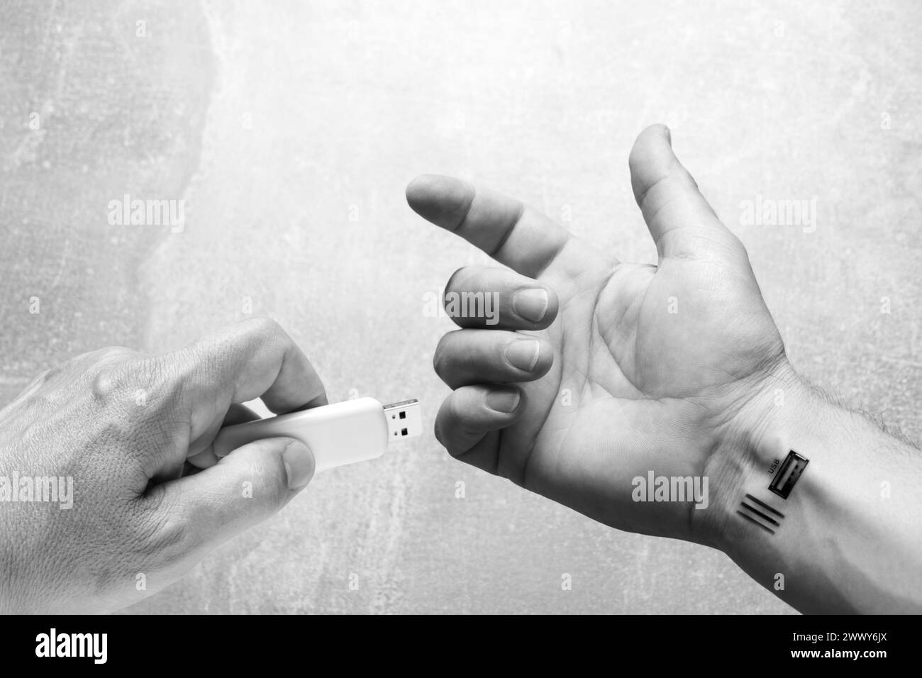 Hands modified person with USB flash drive and USB input on the wrist ...