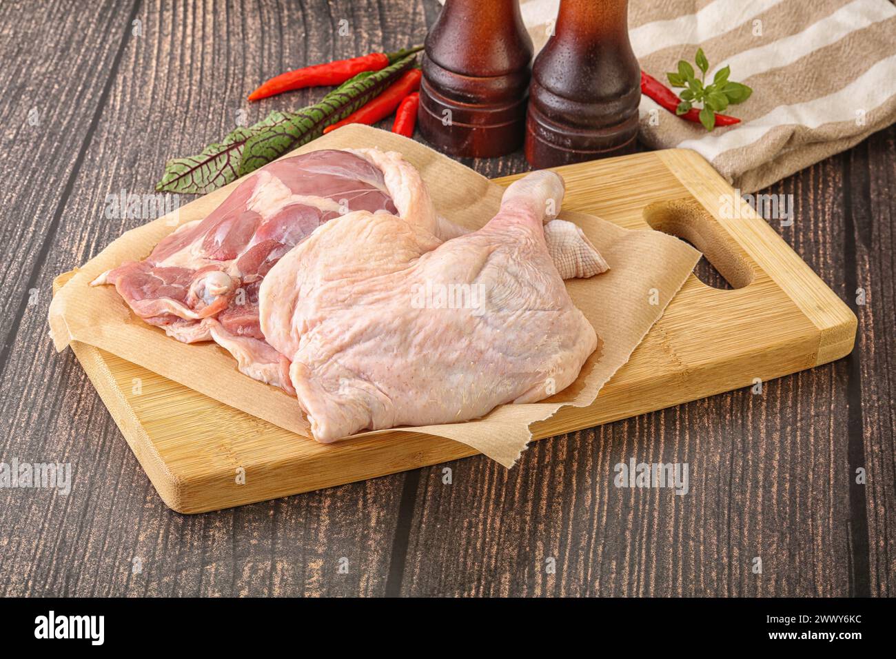 Two Raw duck leg ready for cooking Stock Photo - Alamy