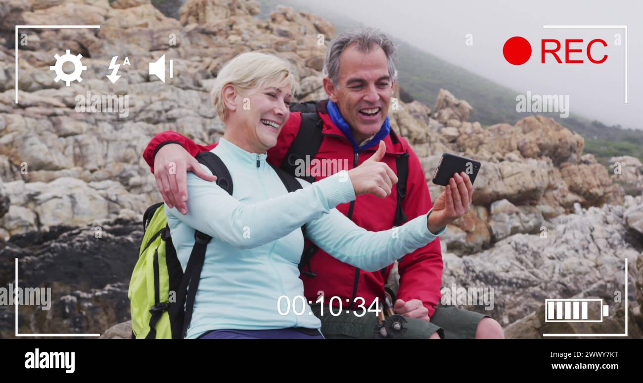 Smartphone image interface screen over happy caucasian senior couple by ...
