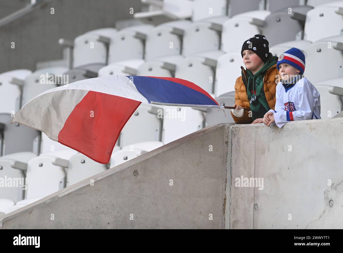 Hradec Kralove, Czech Republic. 26th Mar, 2024. Czech fan wave a ...