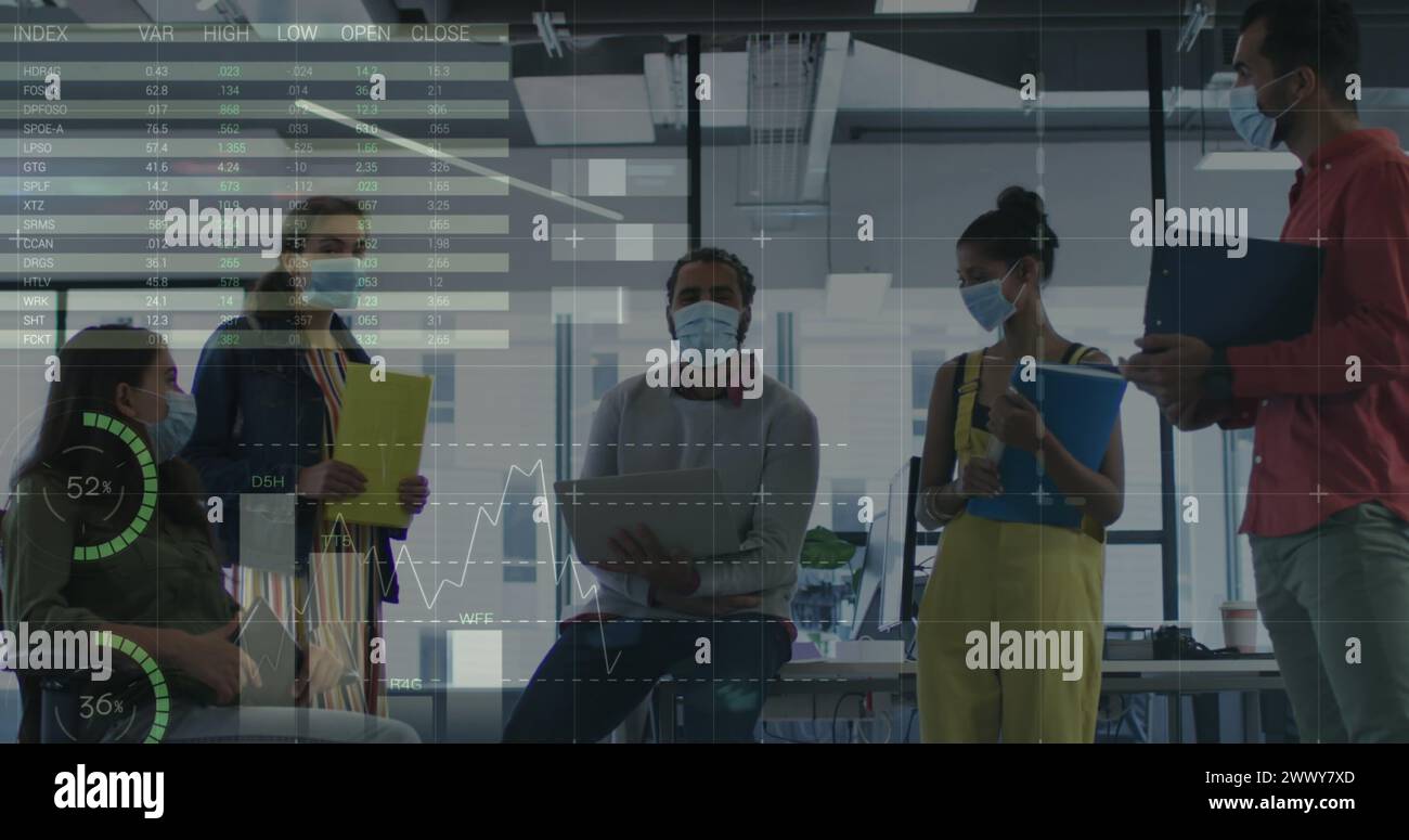 Image of diverse data over diverse male and female colleagues wearing ...