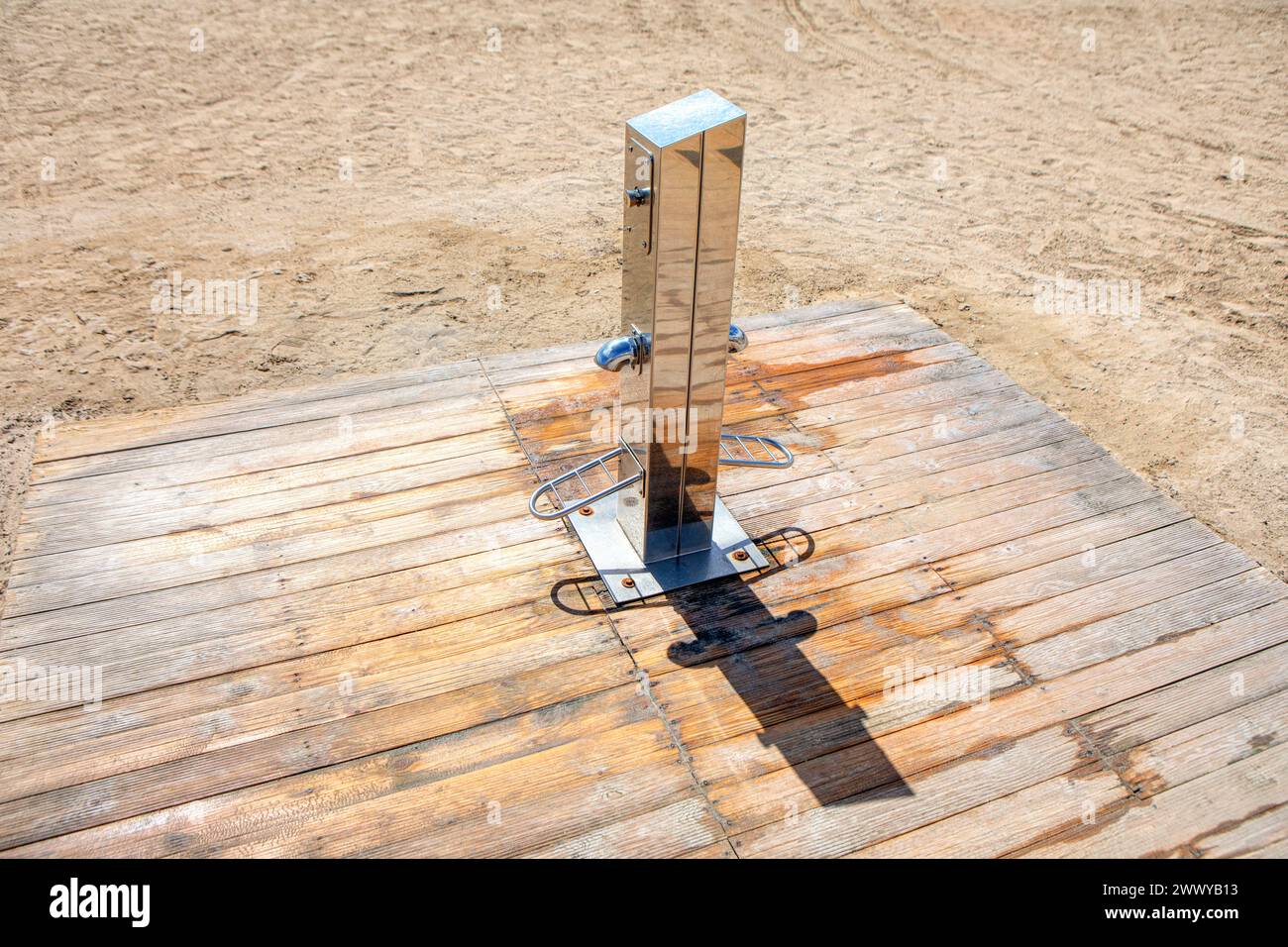 Foot washer on the beach. Shower for washing foot on the sandy beach ...