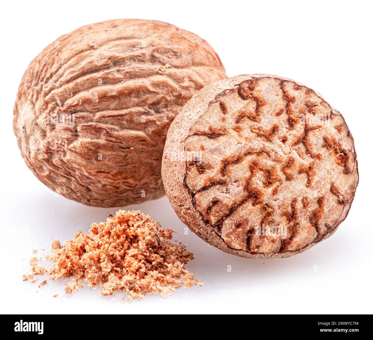 Nutmeg and ground nutmeg heap isolated on white background Stock Photo ...