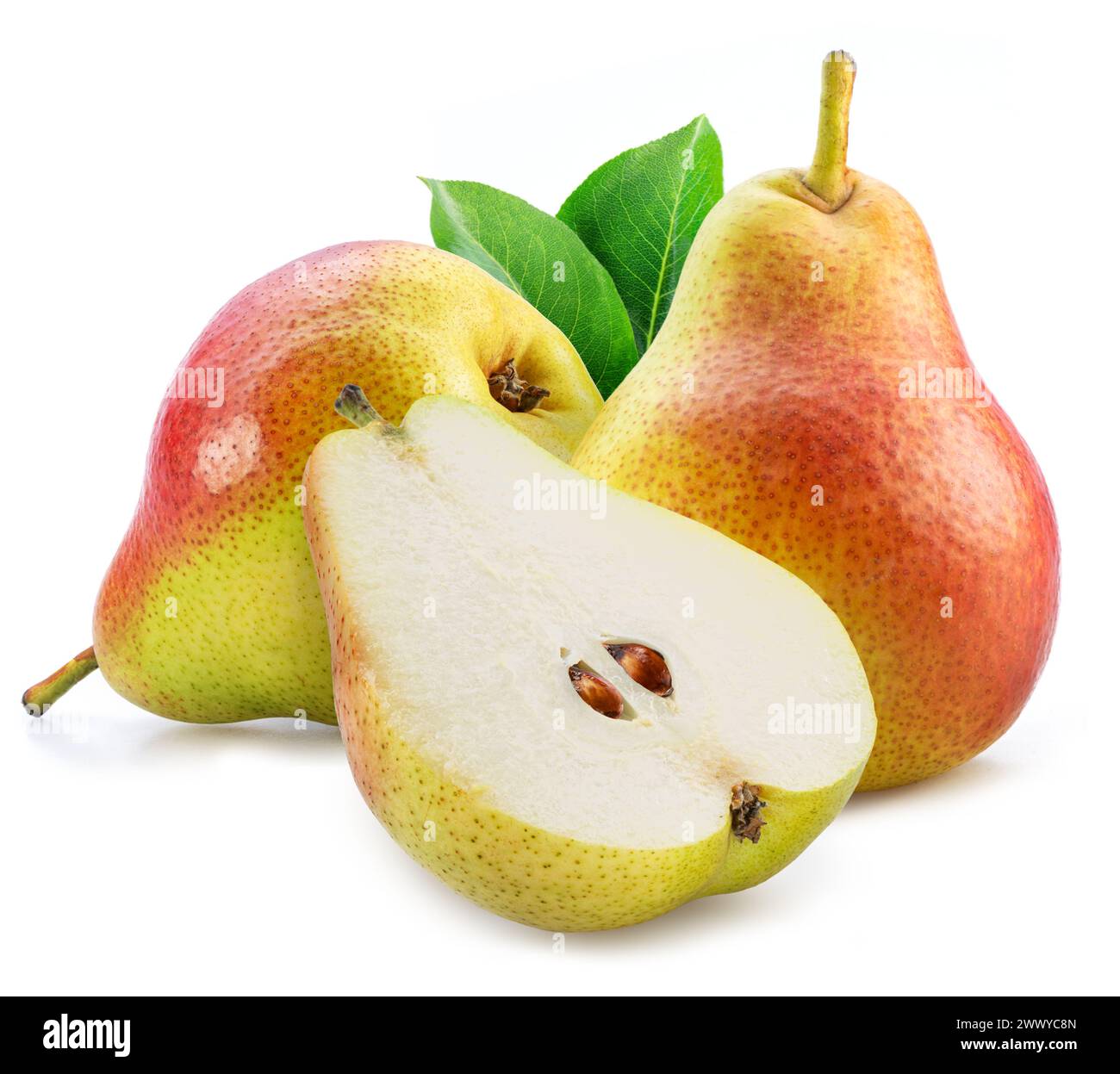 Ripe pears with green leaf and cross section of pear with seeds ...