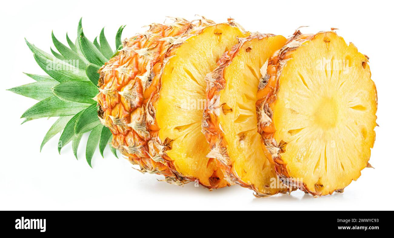 Ripe pineapple and pineapple slices isolated on white background. File ...