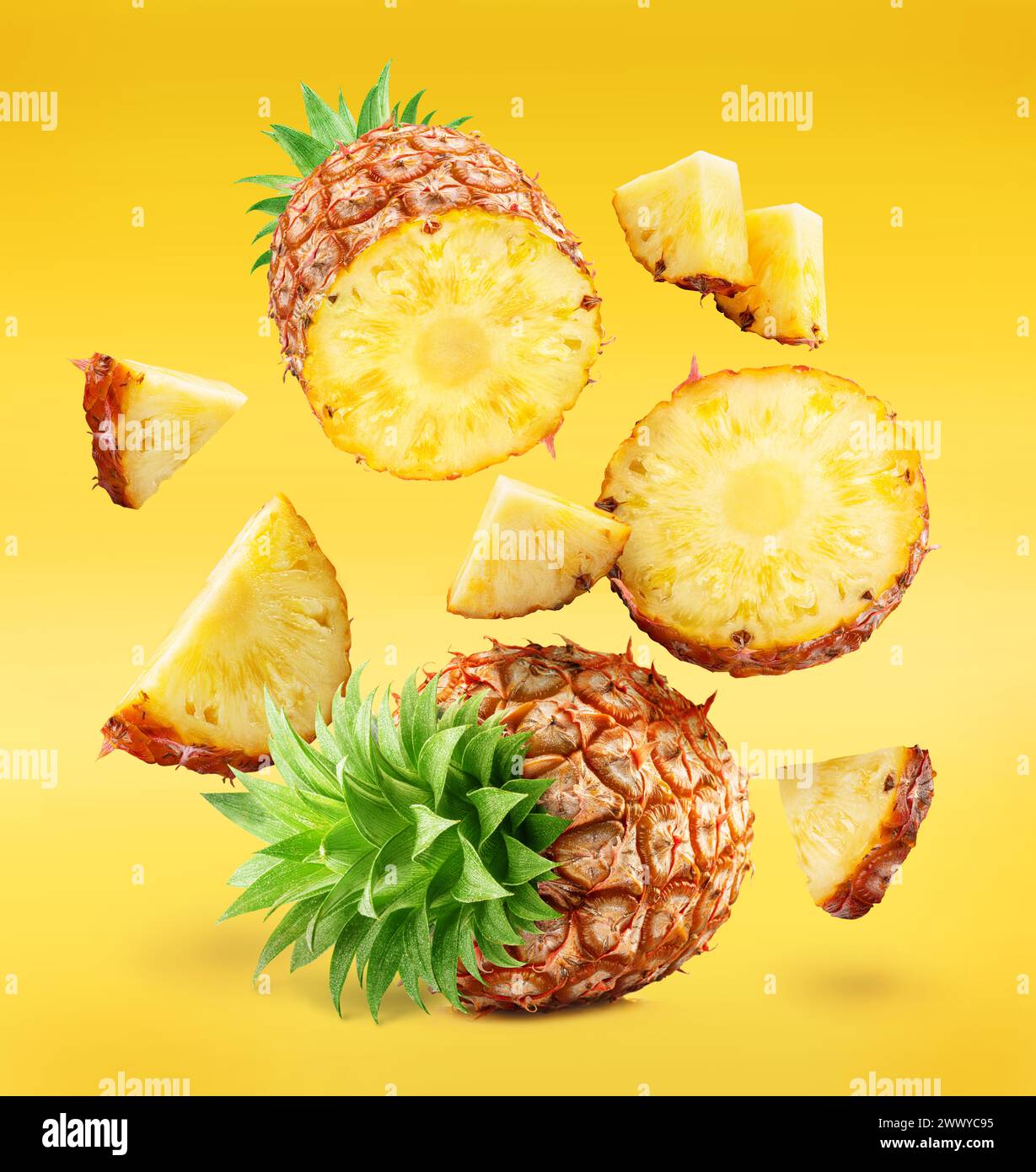 Ripe pineapple and pineapple slices isolated on white background. File ...