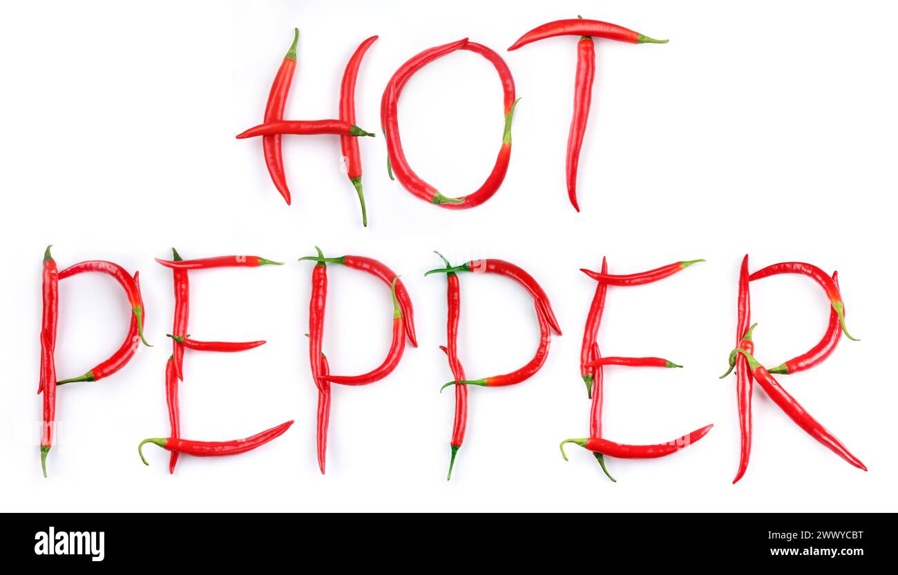 Chili fresh peppers arranged in words "HOT PEPPER" isolated on white ...
