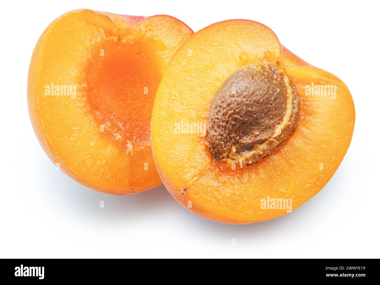 Ripe apricot halves on white background. File contains clipping path ...