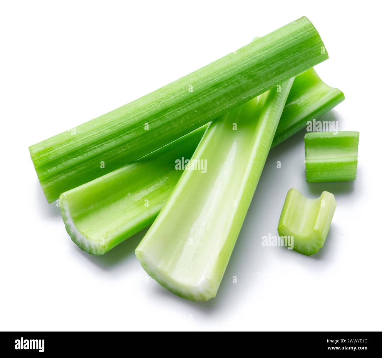 Pile of celery ribs isolated on white background Stock Photo - Alamy