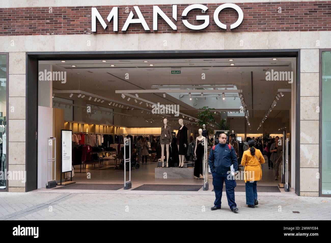 Pedestrians are seen in front of the Spanish multinational clothing ...