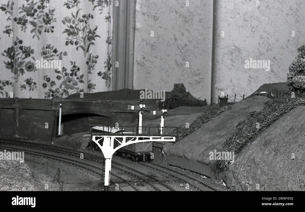 1960s, historical, model railway in a room, picture shows rail track ...