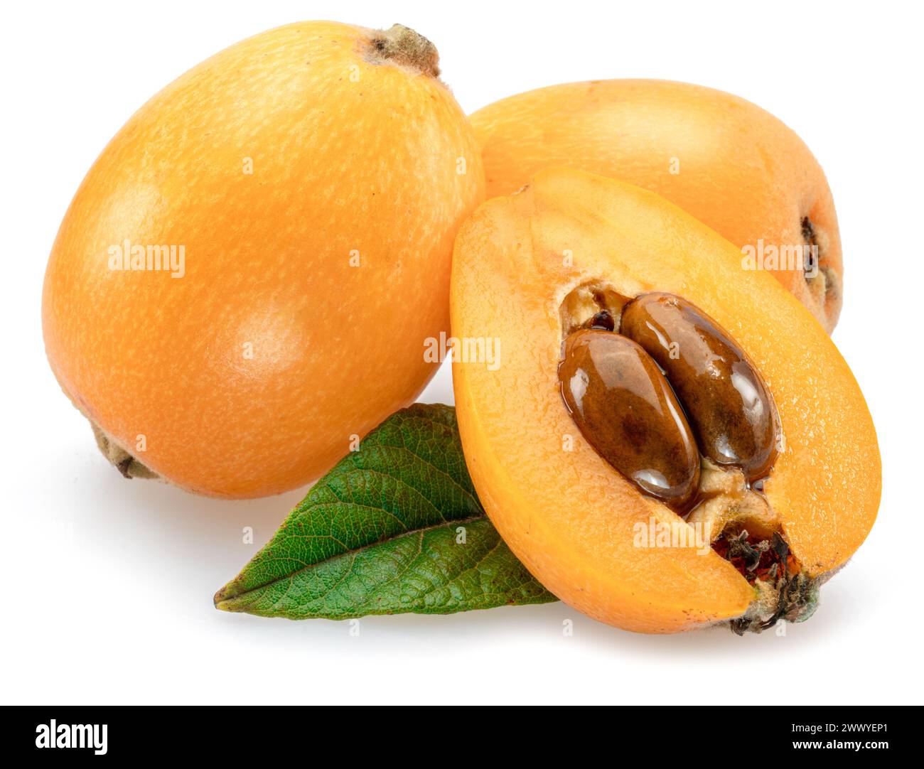 Ripe perfect loquats fruits with green leaves isolated on white ...