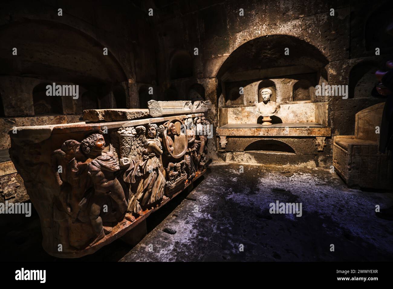 Cologne, Germany. 26th Mar, 2024. A sarcophagus (l) and a bust stand in ...