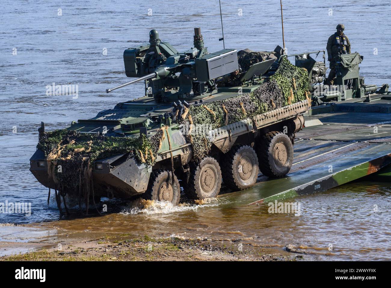 Storkau, Germany. 26th Mar, 2024. A Pandur wheeled armored vehicle of ...