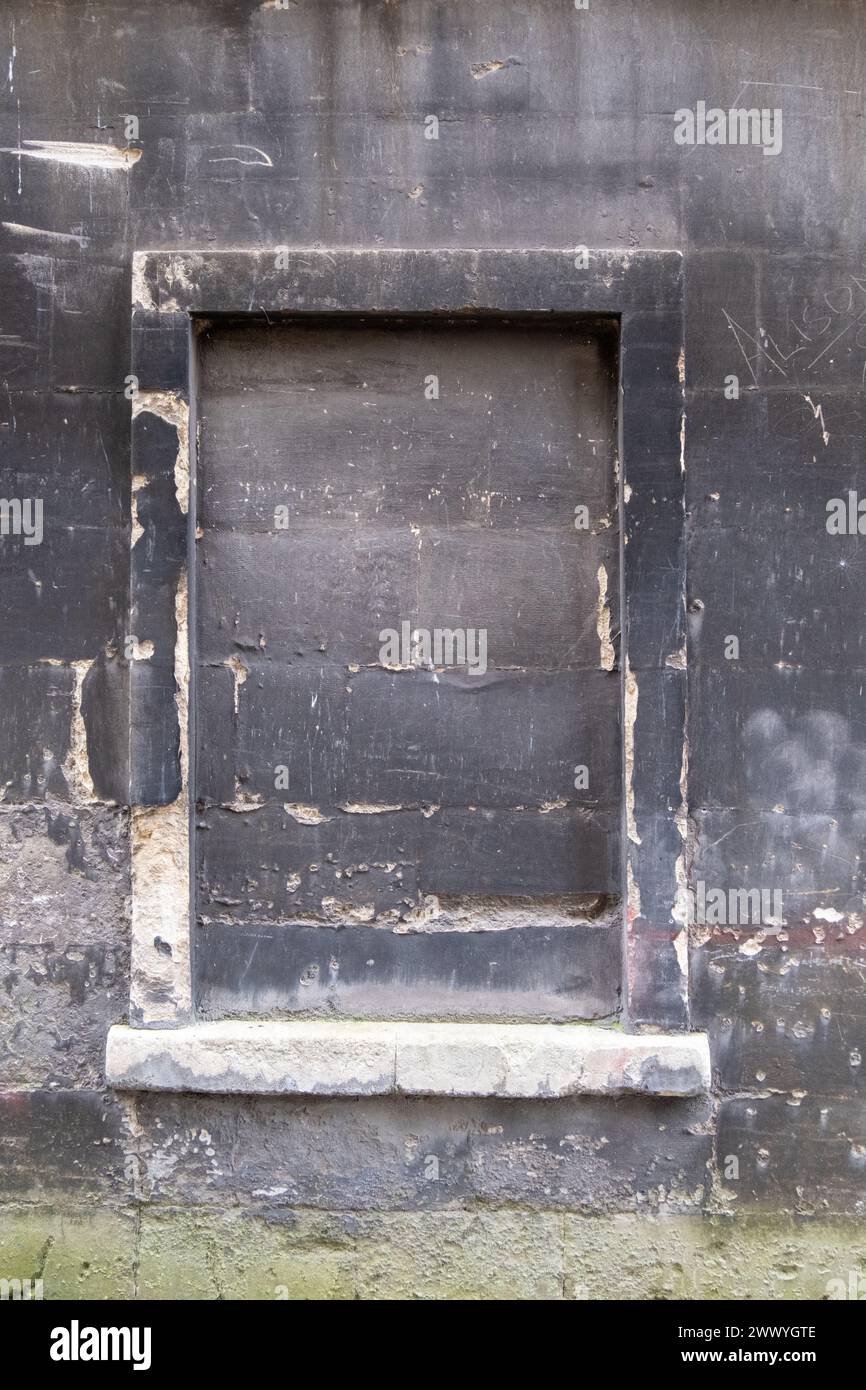 Blocked up window due to window property tax Stock Photo - Alamy
