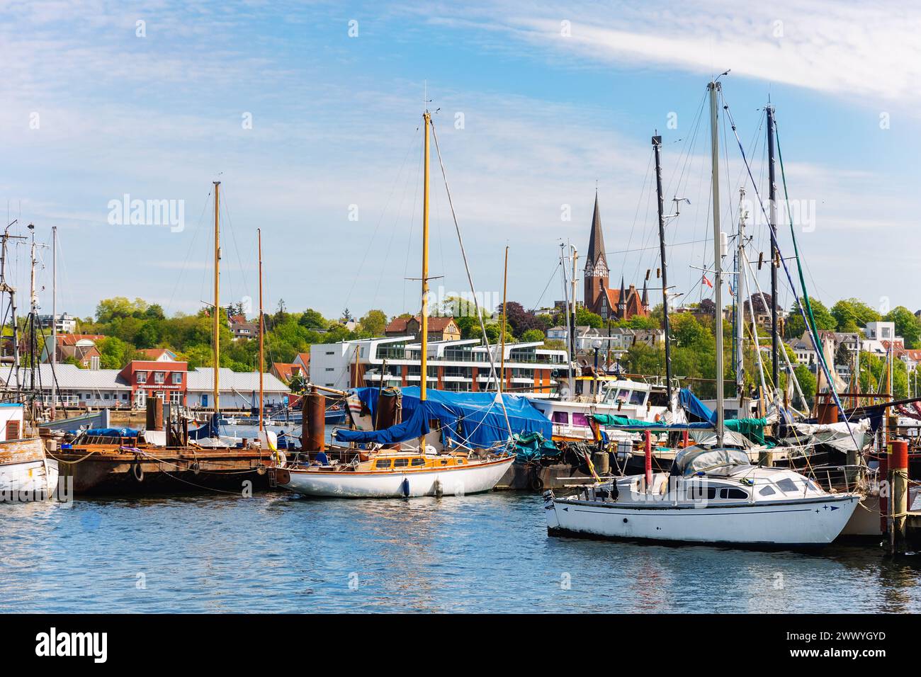 Scenic view fishing boats vessel docked Flensburg marina harbor ...