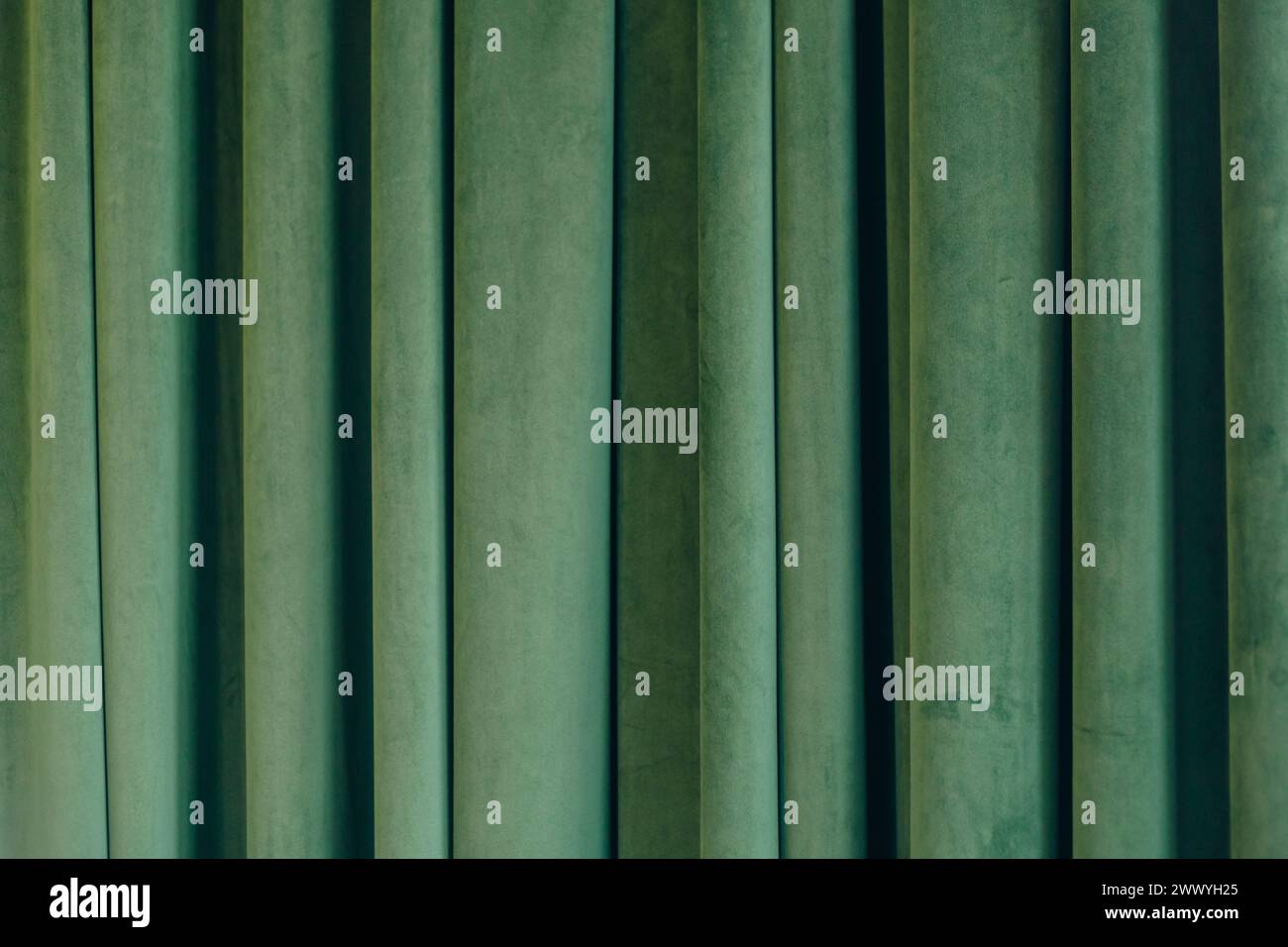 Folded Green velvet curtain texture, background Stock Photo - Alamy