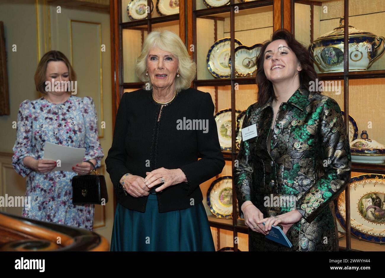 Queen Camilla (centre) and Director, The Queen's Reading Room, Vicki ...