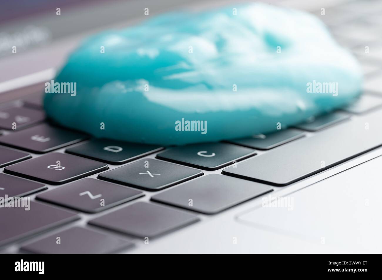 Clean laptop keyboard buttons with blue gel blurred background Stock ...
