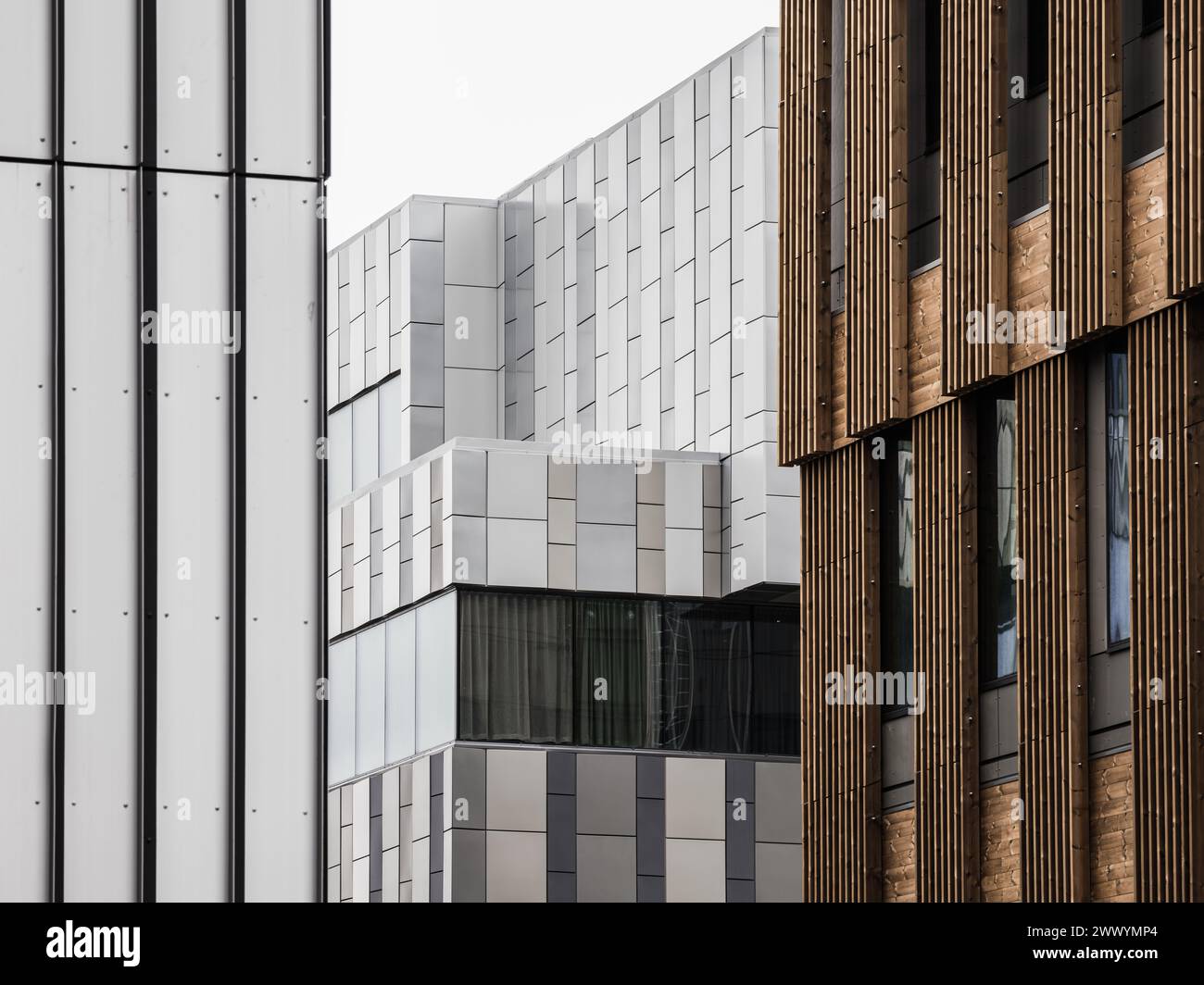 The photo shows a couple of tall buildings standing next to each other ...