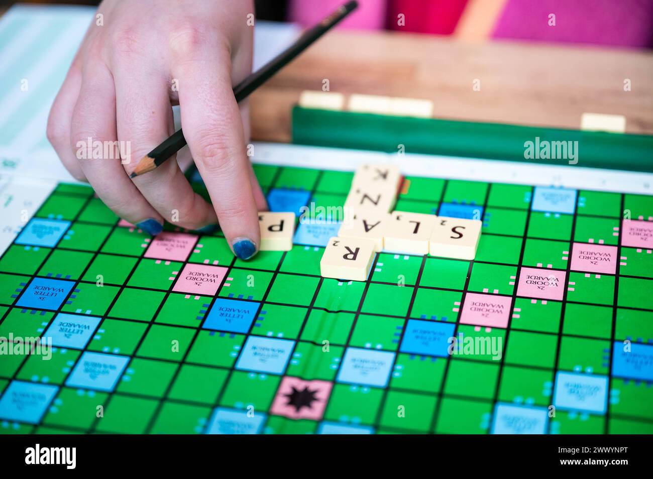 Brussels Old Town, Belgium, March16, 2024 - Lady playing scrable in ...