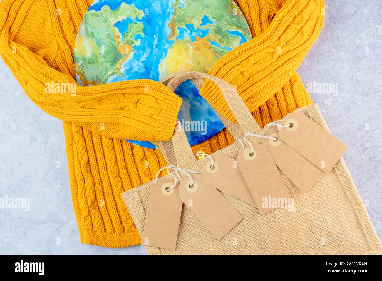 Close up collection of tags on an eco bag. Creative concept buy less ...
