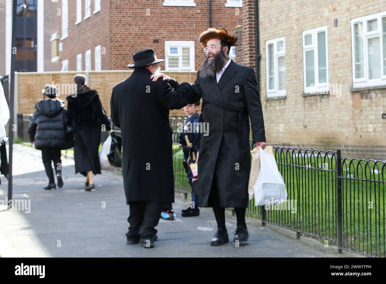 Orthodox men dressed in costumes take part in the annual festival of ...