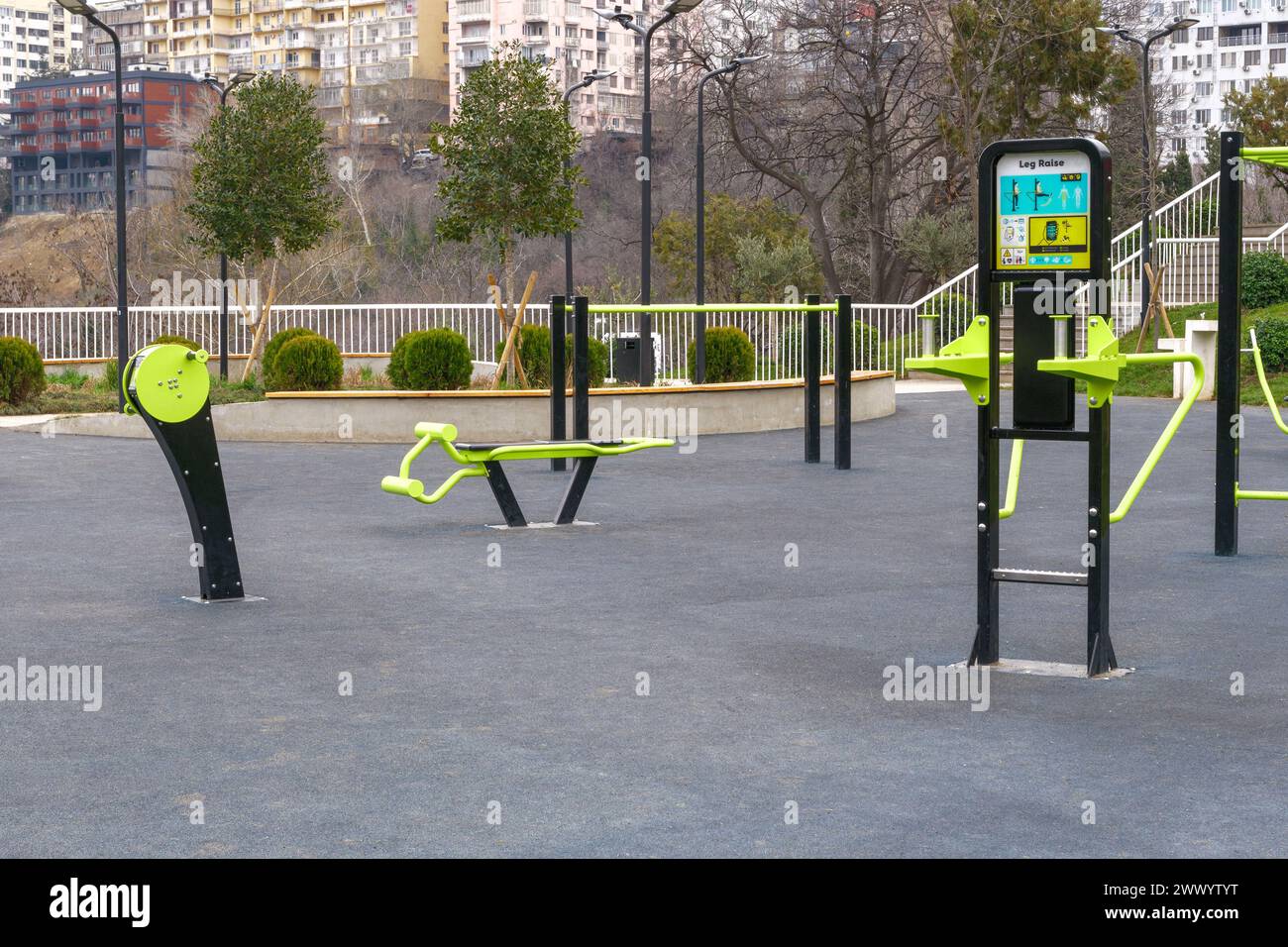 A variety of outdoor fitness machines are installed in the public park ...