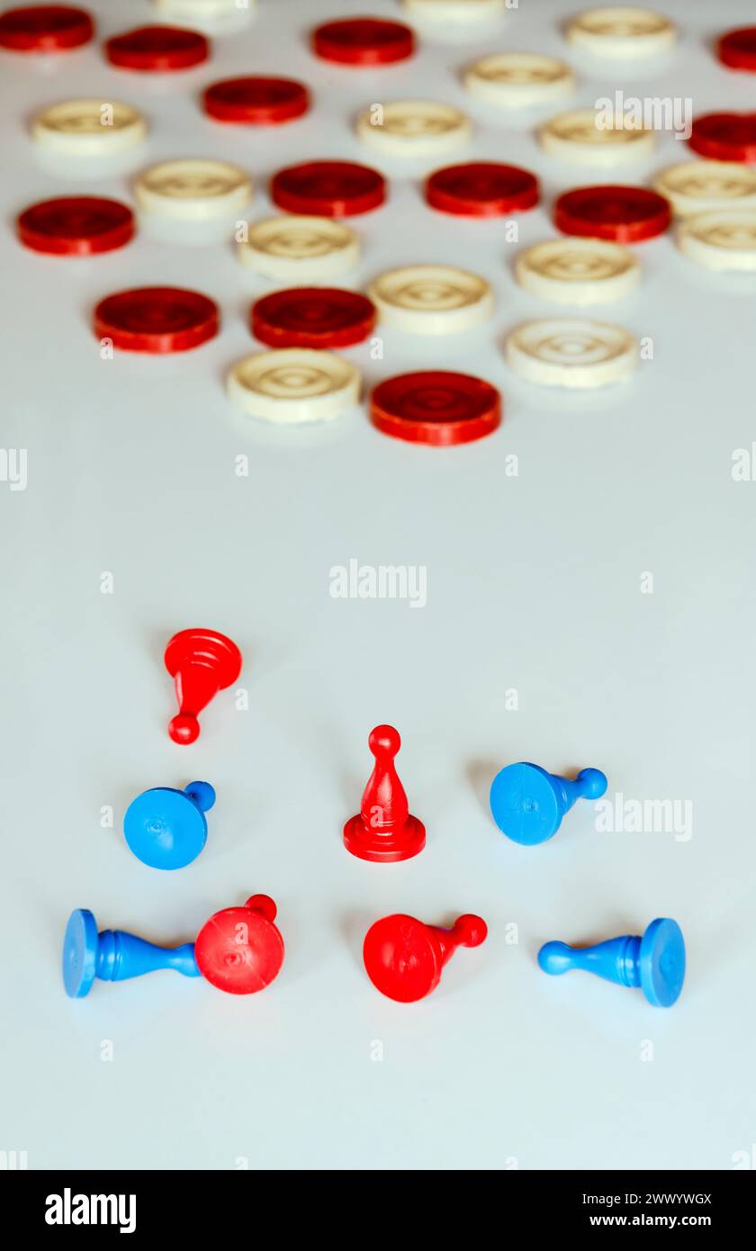 Old game & new game, checkers & game pieces seen in red, blue & white ...