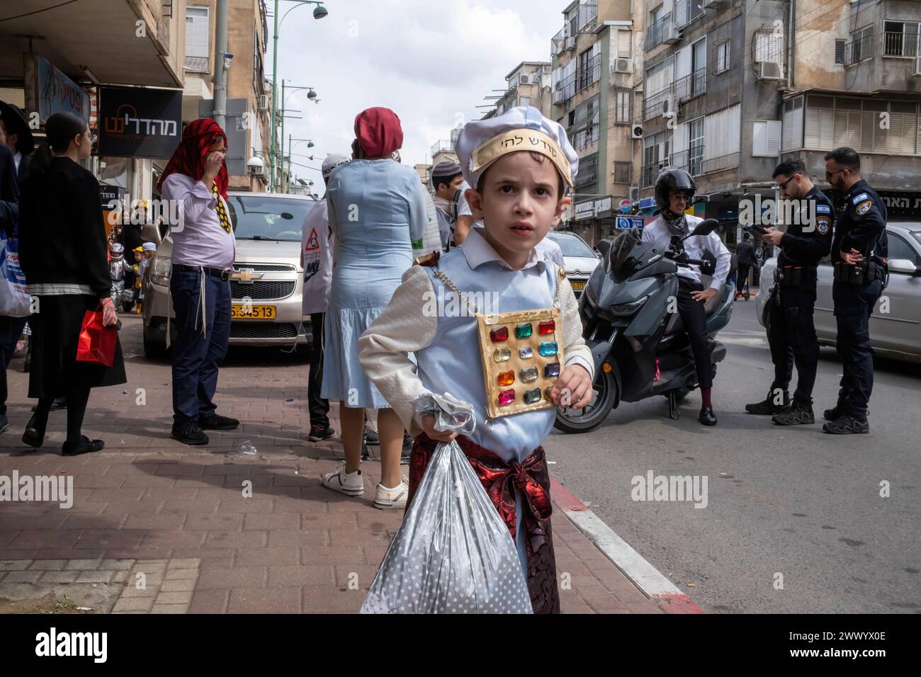 A young boy dressed as a "Cohen", of High Priest is seen during the ...