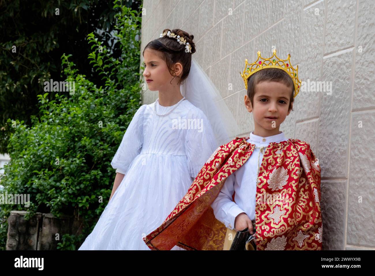 Two children dressed in King David and Queen Esther costumes seen ...