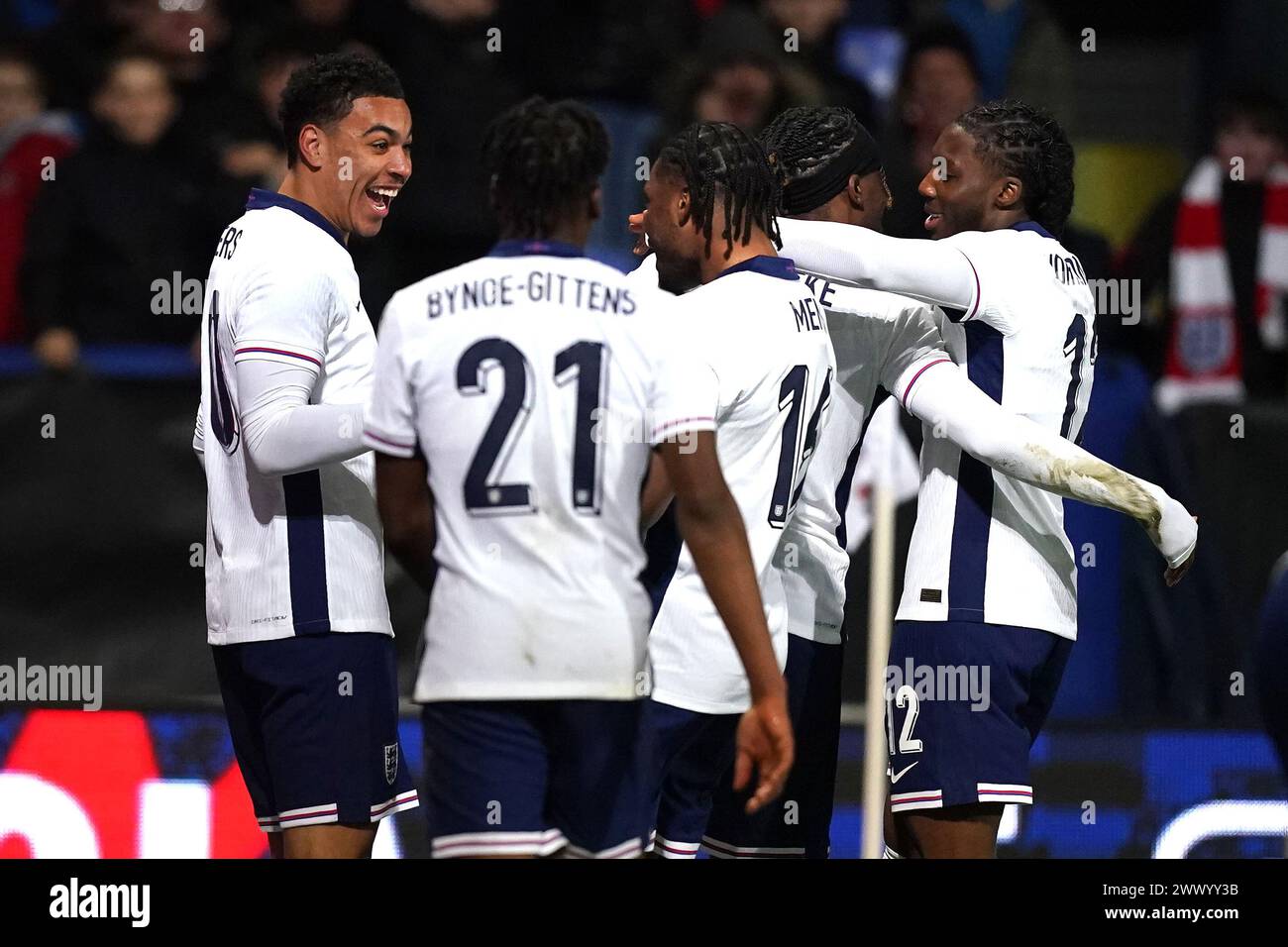 England's Morgan Rogers (left) celebrates scoring their side's fifth ...