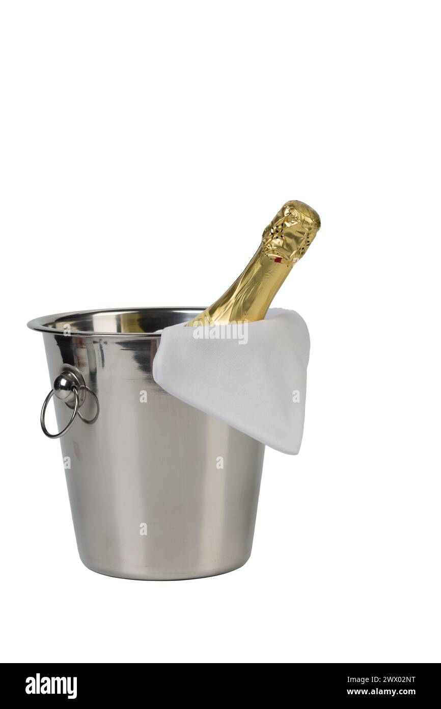 Bottle of champagne in bucket. Isolated over white background. Close-up ...