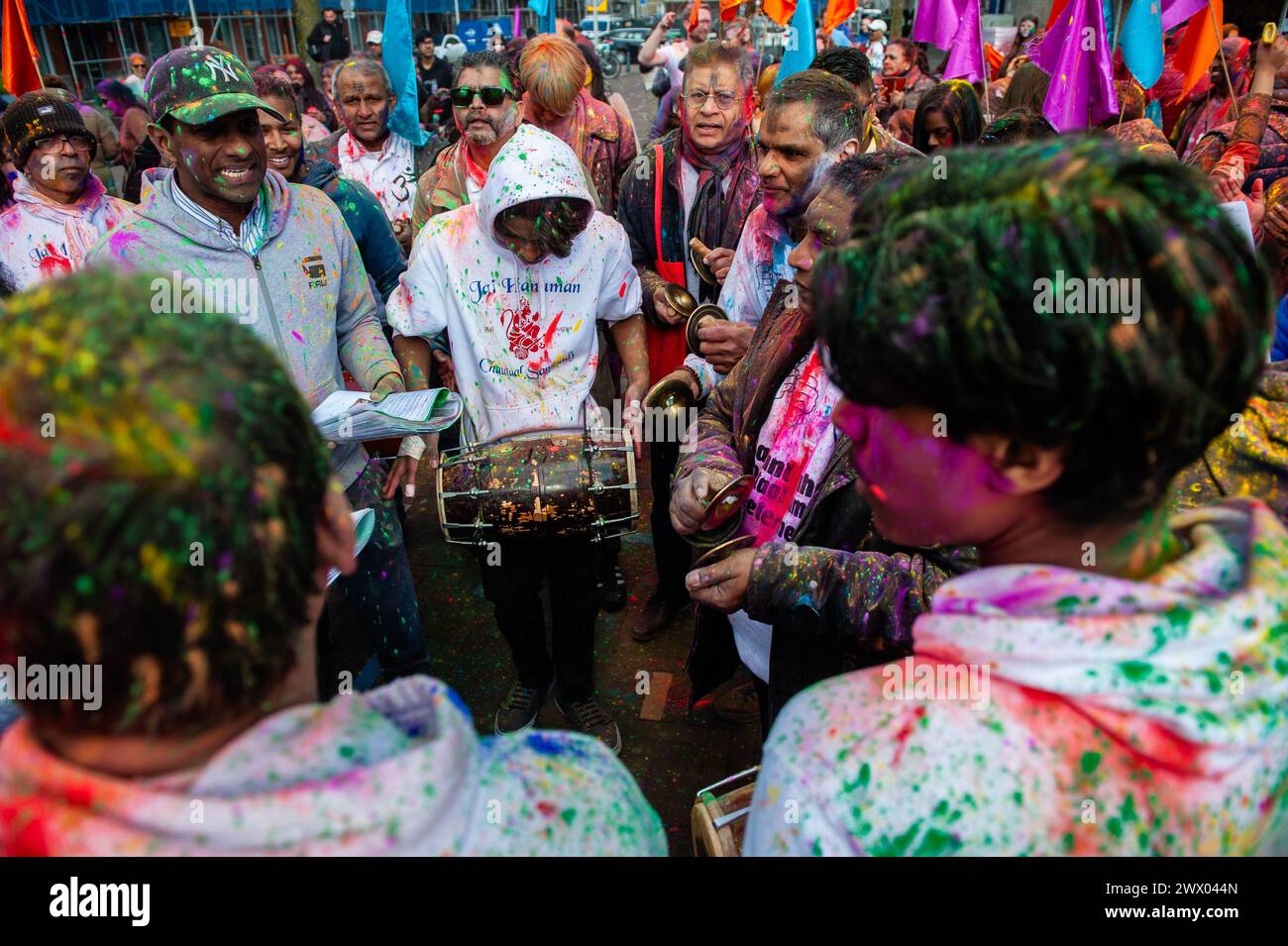 People are seen playing traditional Indian music. Millions of people ...