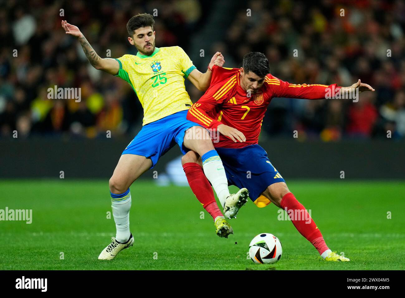 Madrid, Spain. 26th Mar, 2024. Lucas Beraldo of Brazil and Alvaro ...