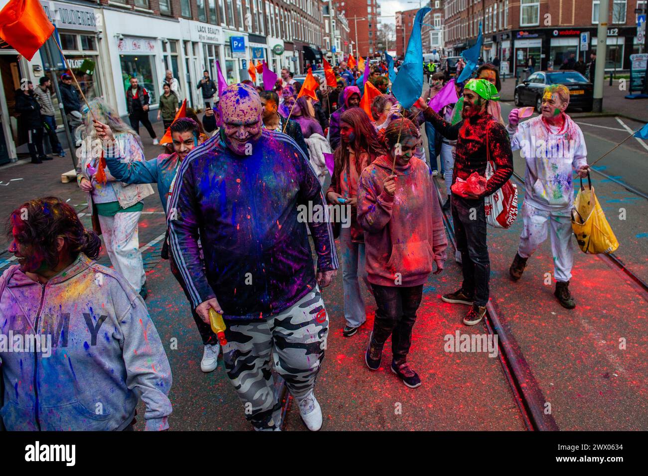 People are seen walking during a colorful procession. Millions of ...
