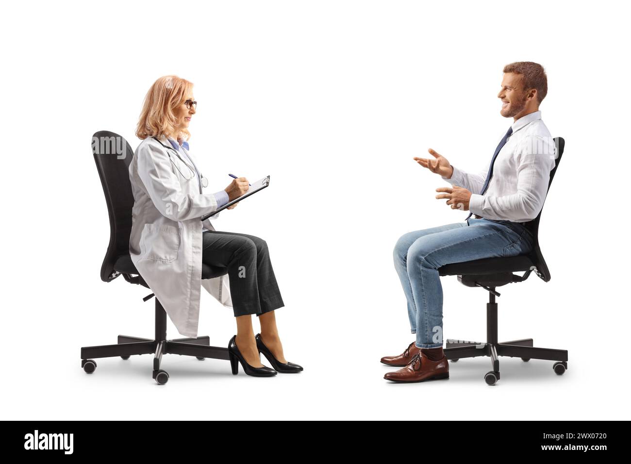 Man at a doctors appointment talking to a female doctor isolated on ...