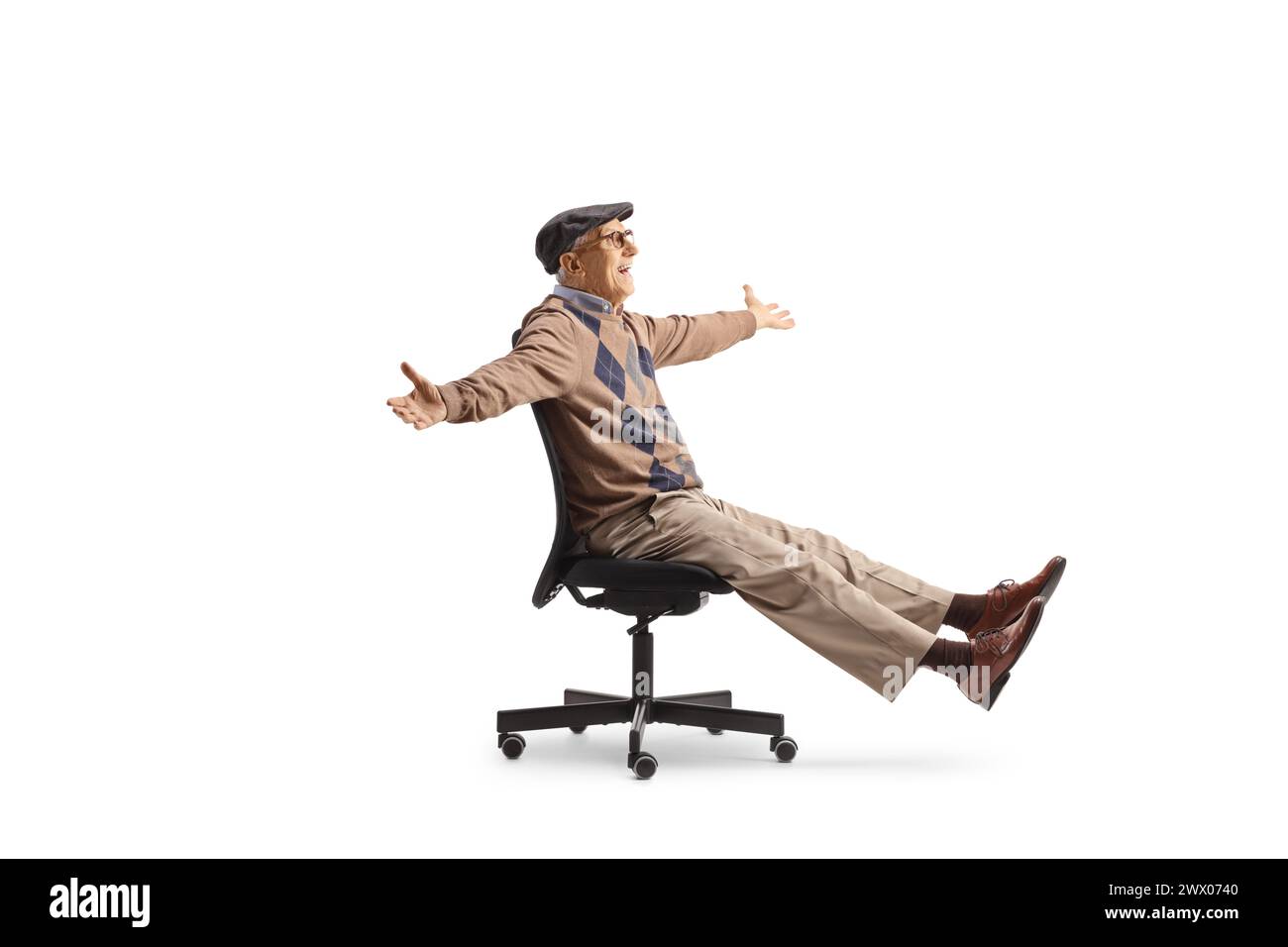 Elderly man spinning on an office chair isolated on white background Stock Photo - Alamy
