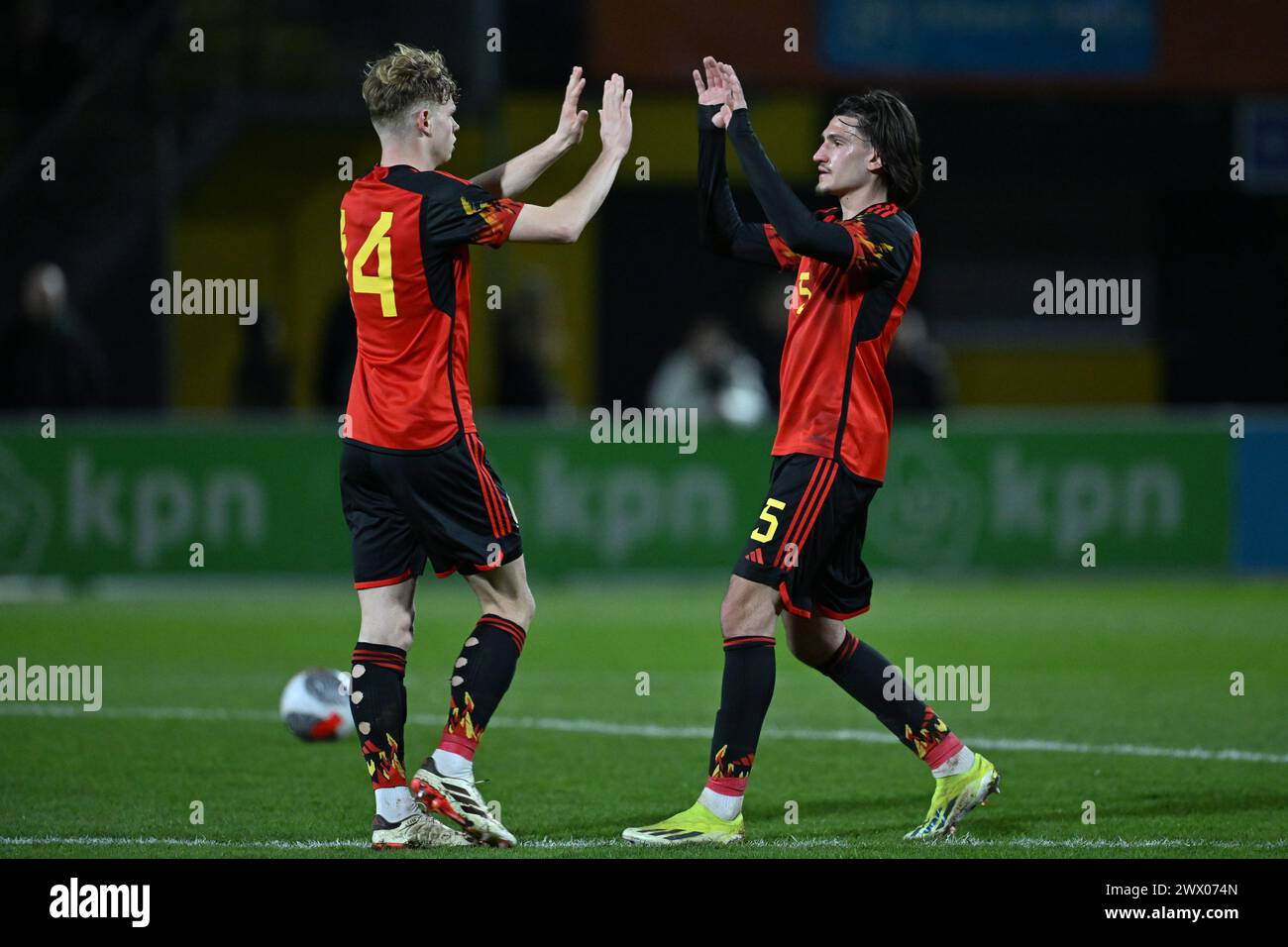 Arthur Piedfort (14) of Belgium celebrates with Vincent Burlet (5) of ...
