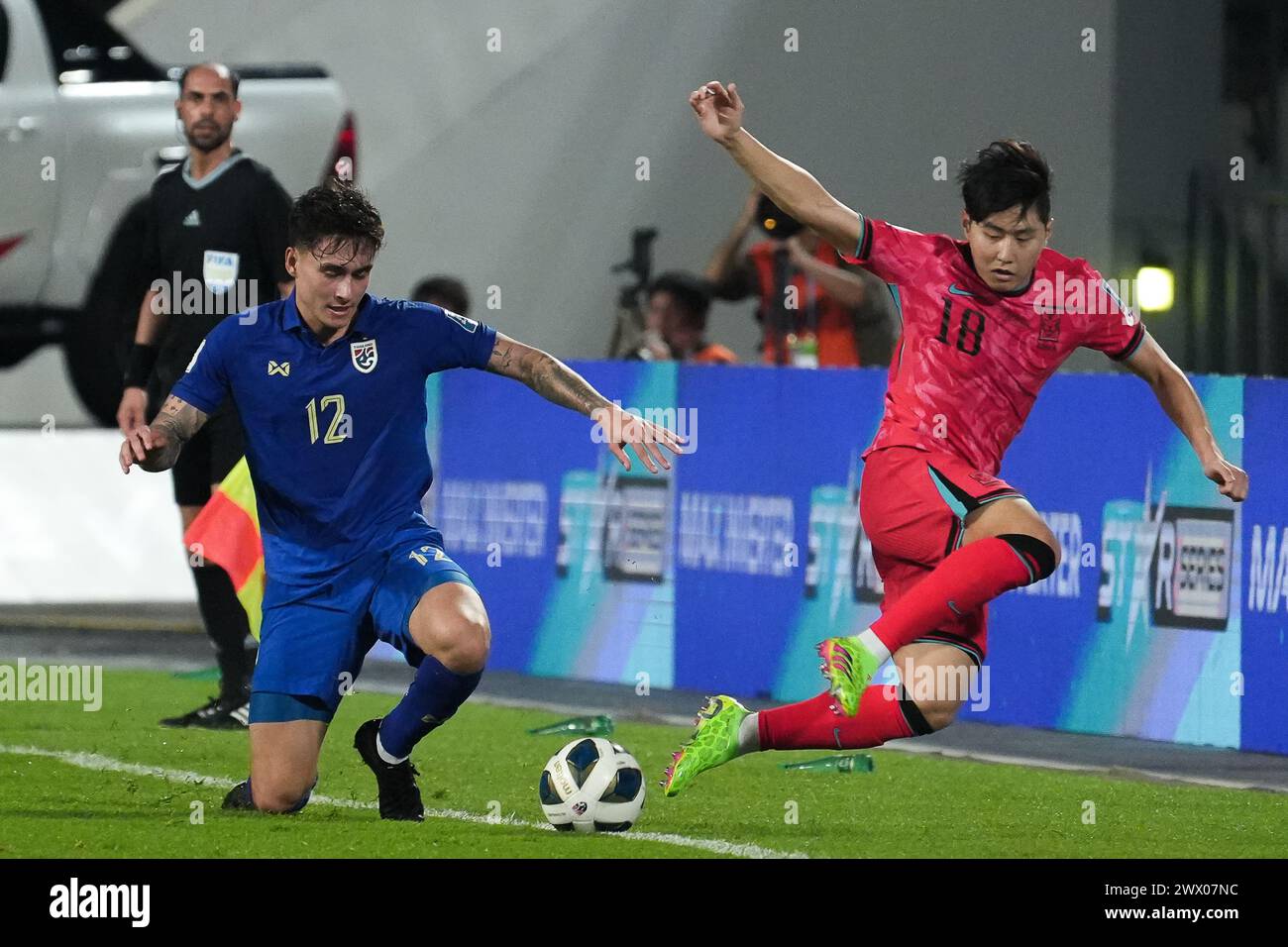 Bangkok, Thailand. 26th Mar, 2024. Nicholas Mickelson (L) of Thailand ...
