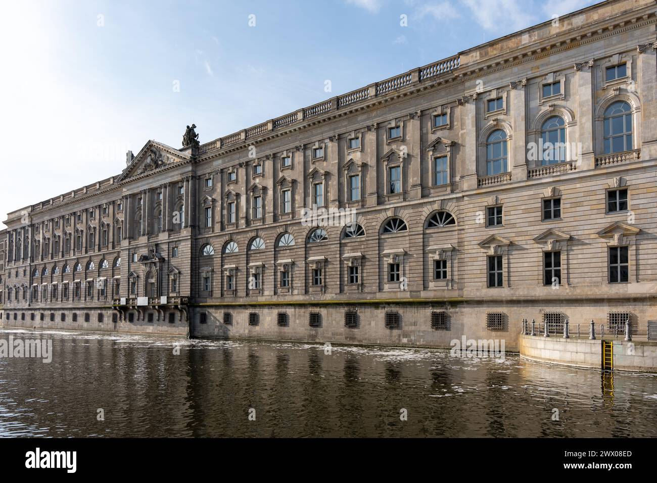 The river flows along the ancient houses of the European city of Berlin ...