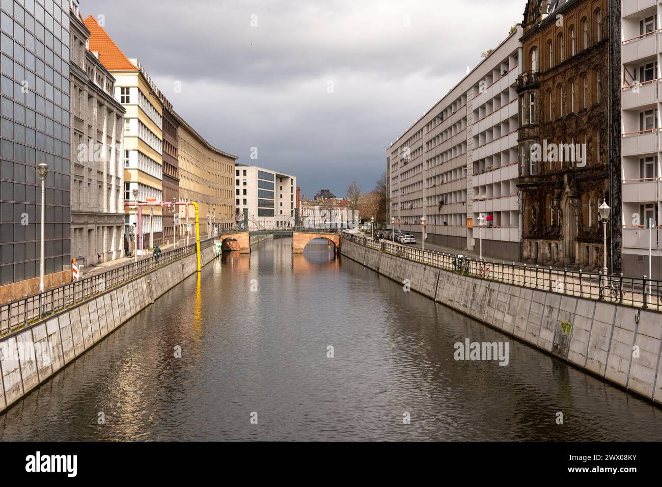 The river flows along the ancient houses of the European city of Berlin ...