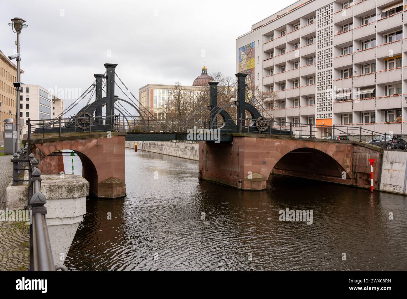 An ancient drawbridge across the river in Berlin. Close-up of the old ...