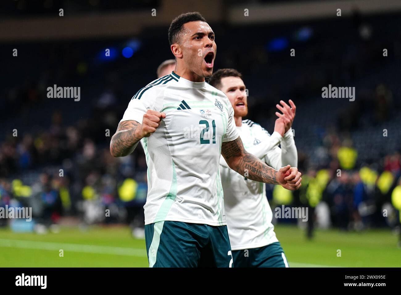 Northern Ireland's Josh Magennis (centre) celebrates after the final ...