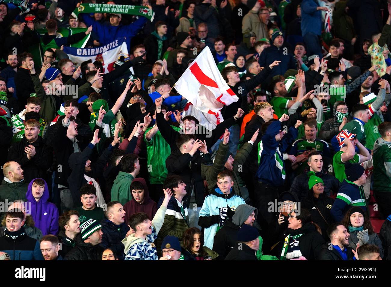 Northern Ireland fans celebrate victory after the final whistle in a ...