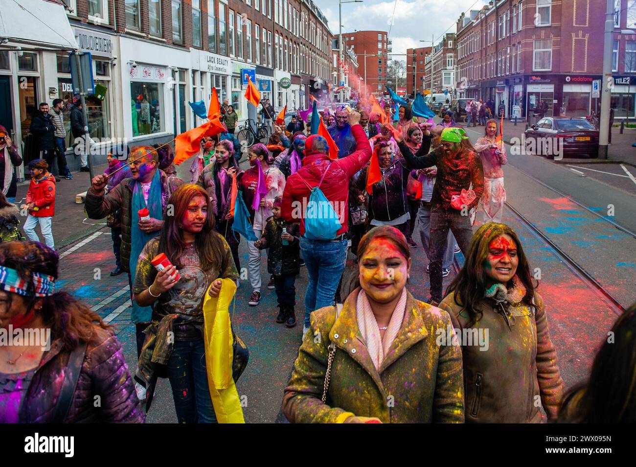 March 25, 2024, The Hague, Netherlands: People are seen walking and ...