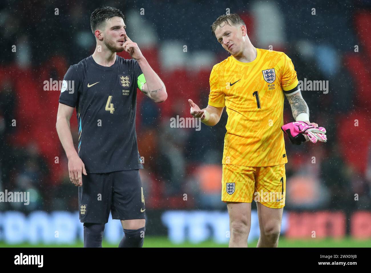 Declan Rice of England speaks to Jordan Pickford of England after the ...