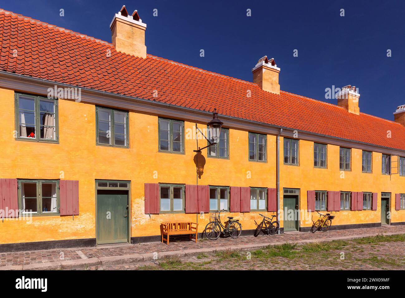 District Nyboder with yellow historic row houses in Copenhagen, Denmark ...